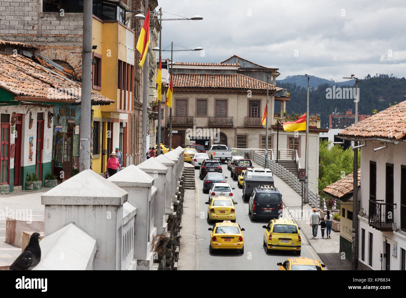Cuenca Ecuador - traffic, taxis and flags in the city centre, Cuenca ...