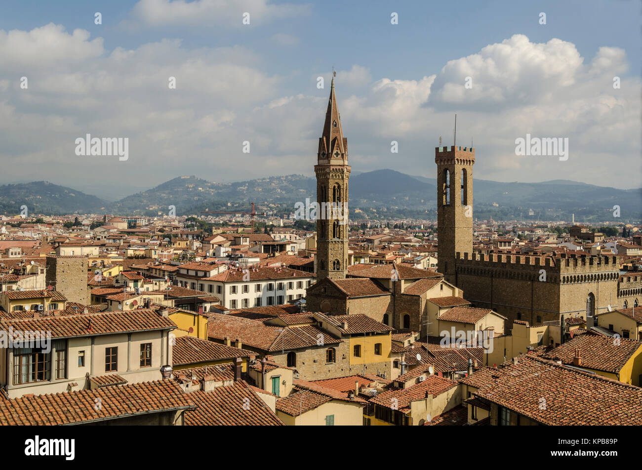 View of the city of Florence where the towers of the badia and the ...