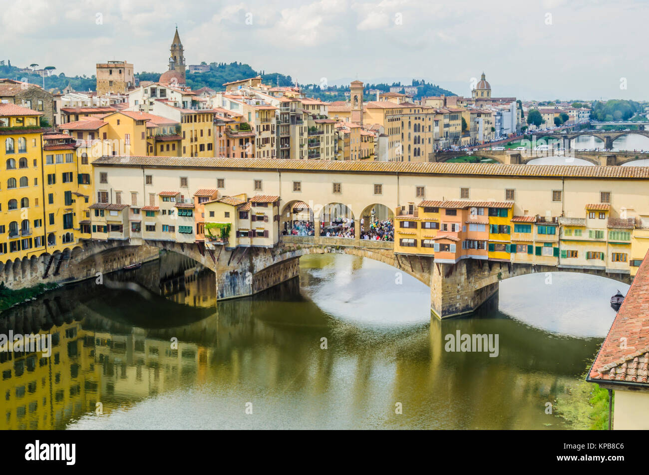 view of the bridge vecchio of florence and successive bridges crossing ...