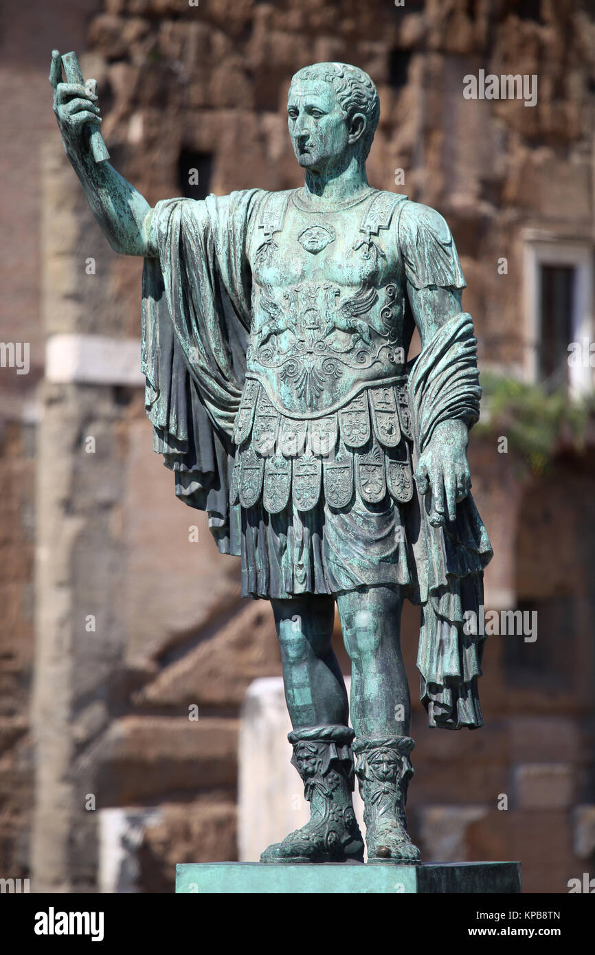 Statue S.P.Q.R. IMP.CAESARI NERVAE Augustus on street Via dei Fori ...