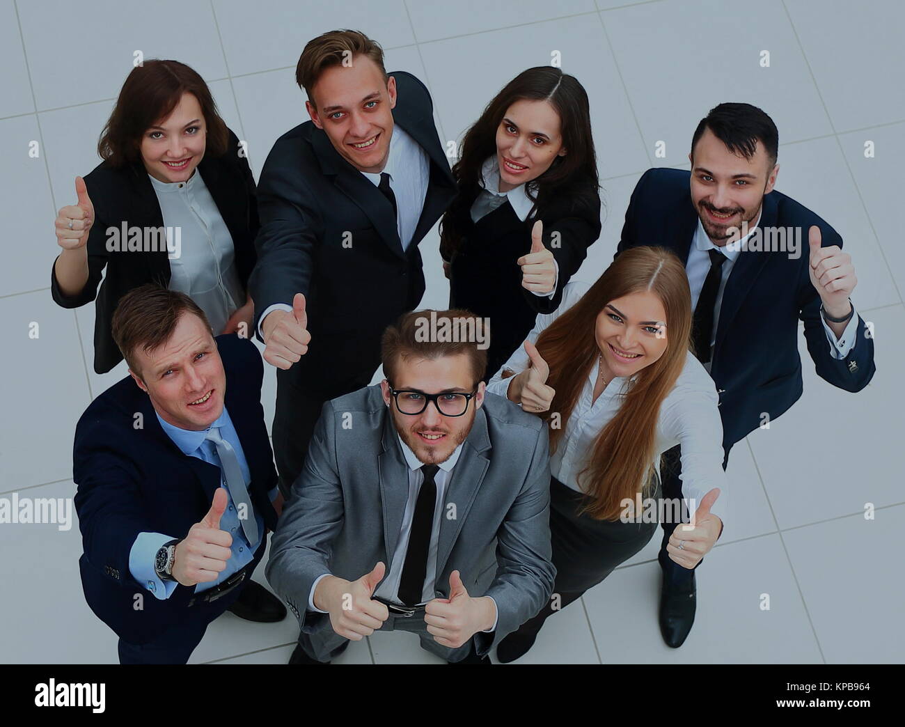 Top view of executives smiling and pointing Stock Photo - Alamy