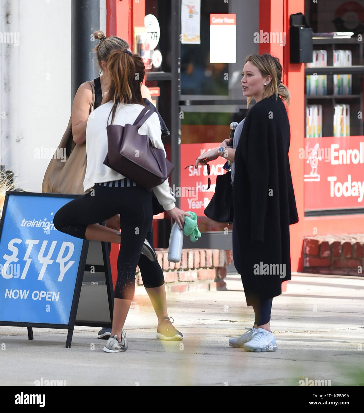 Hilary Duff chats with friends after a workout Featuring: Hilary Duff ...