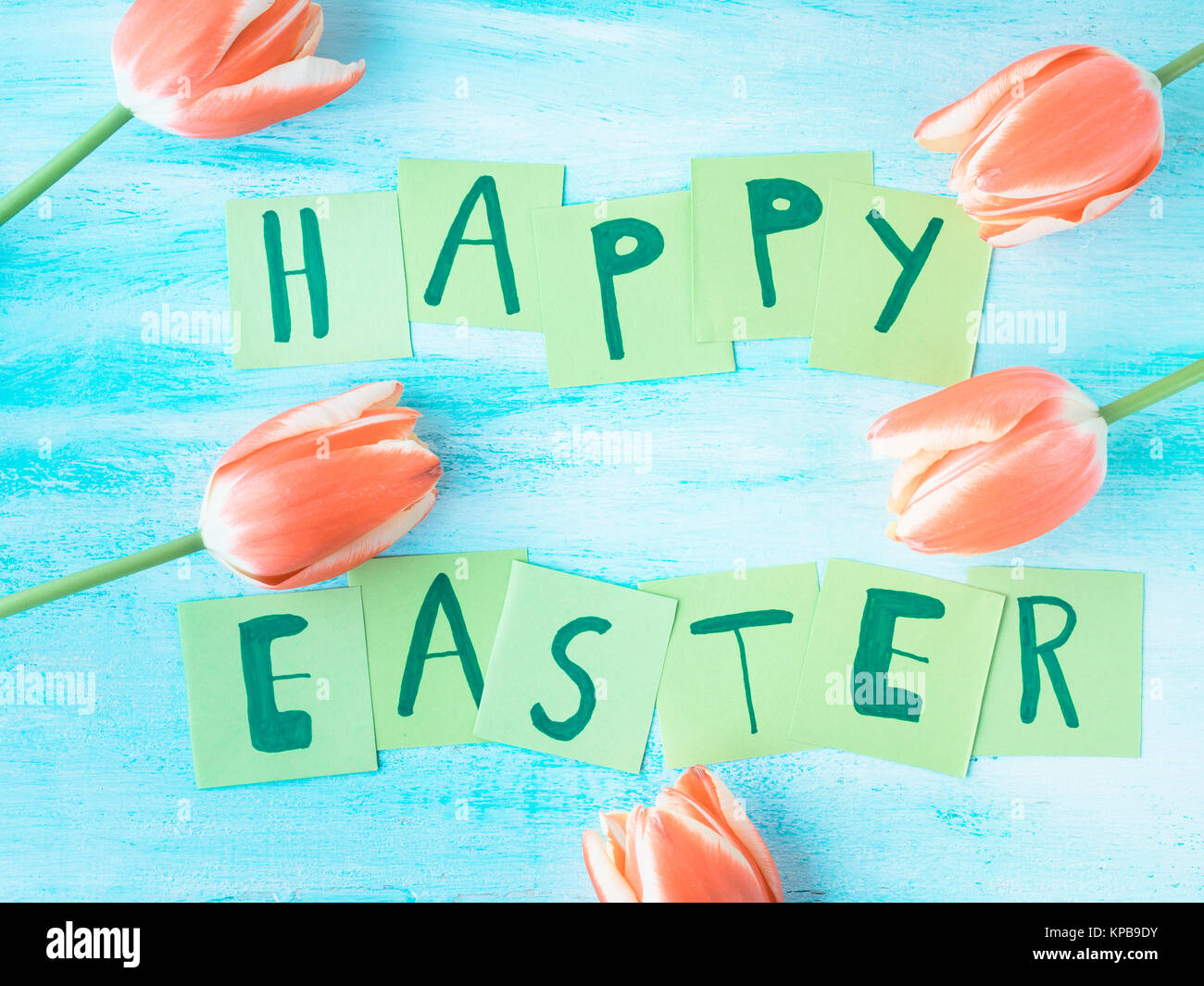Happy Easter background tulips flowers hand written letters. Green ...