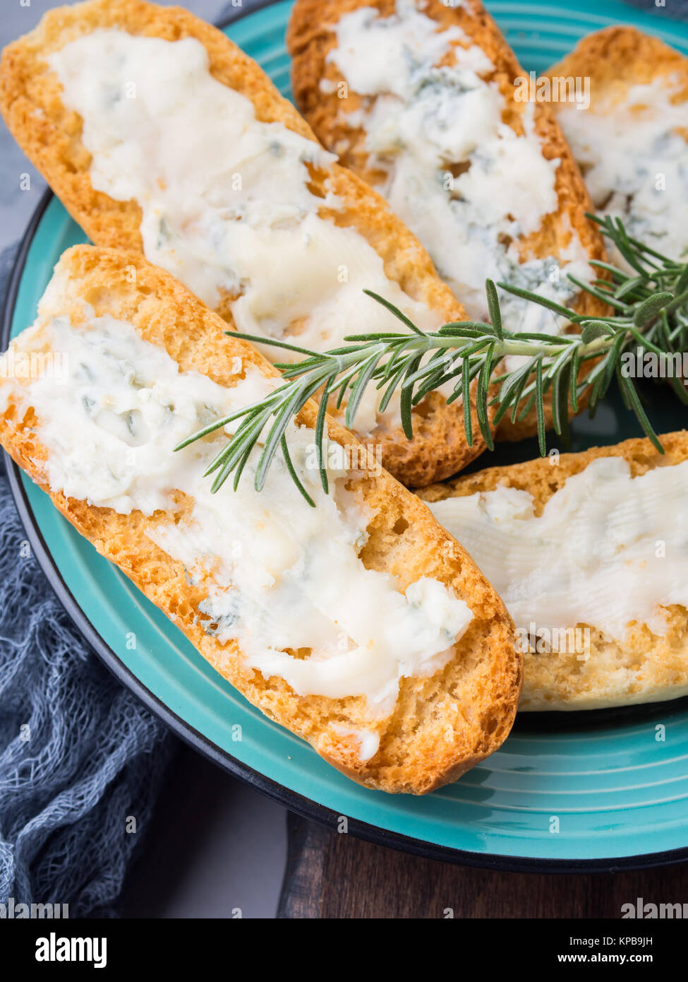 Italian toasts with gorgonzola cheese on rustic background with wine ...