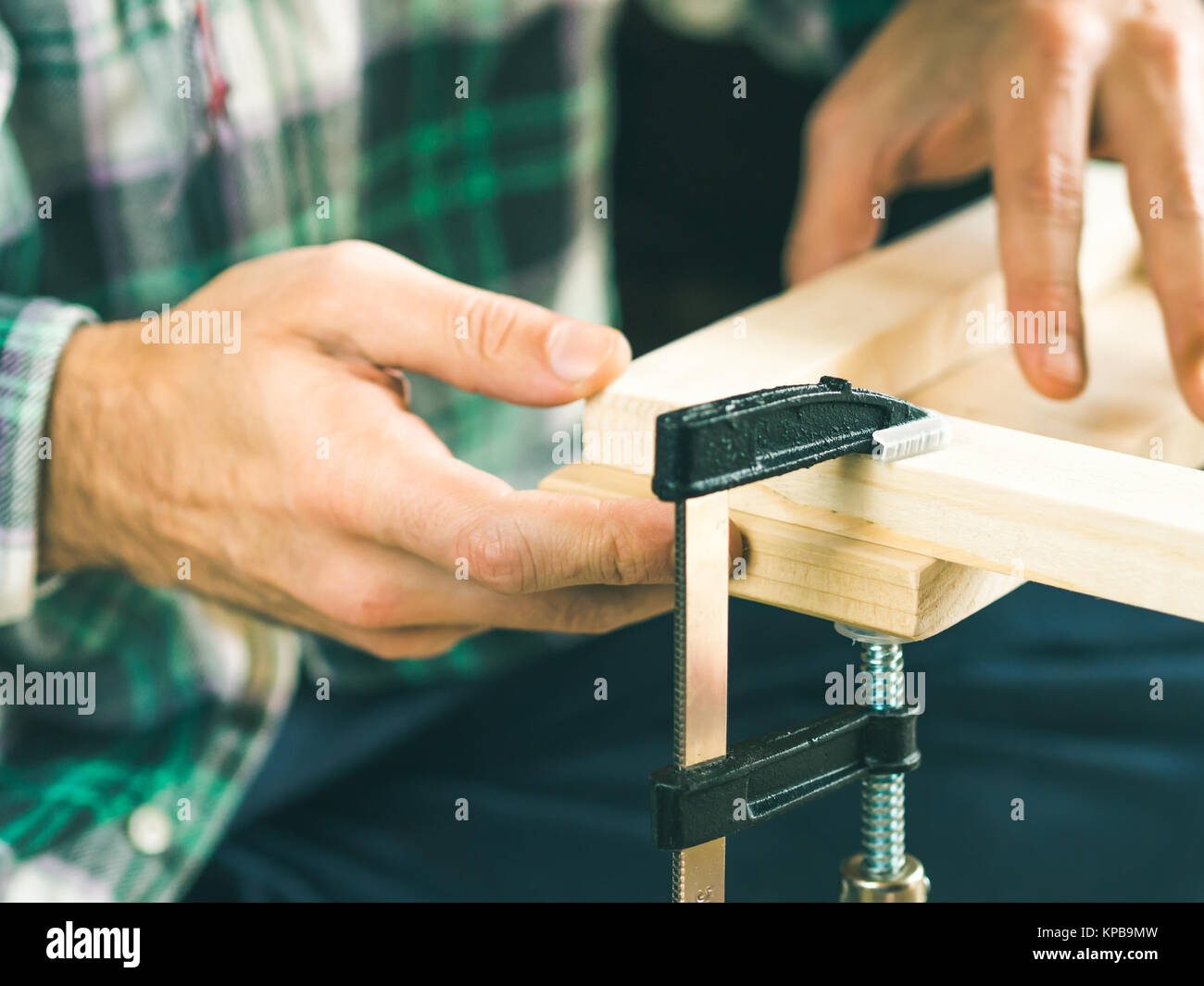 Man crafting wooden chair object keeping wooden boards in hands. Do it ...
