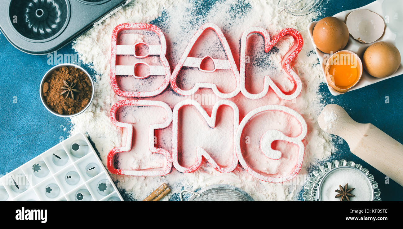 Flour letters spelling Baking with tools and sweet food ingredients ...