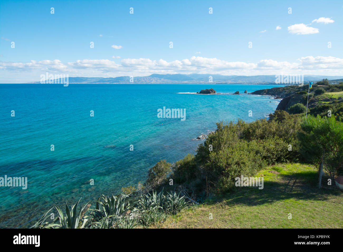 Coastal landscape with clear blue sea and blue sky along the Akamas ...