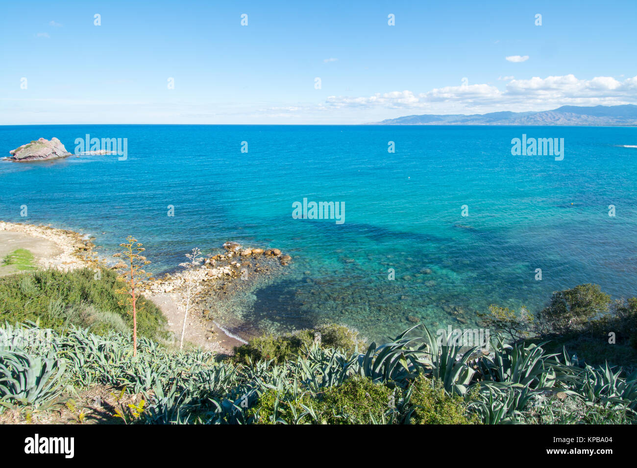 Coastal landscape with clear blue sea and blue sky along the Akamas ...