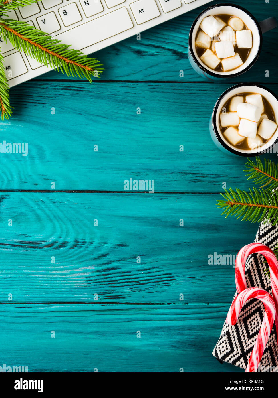 Winter christmas green background with hot chocolate, green branch and ...