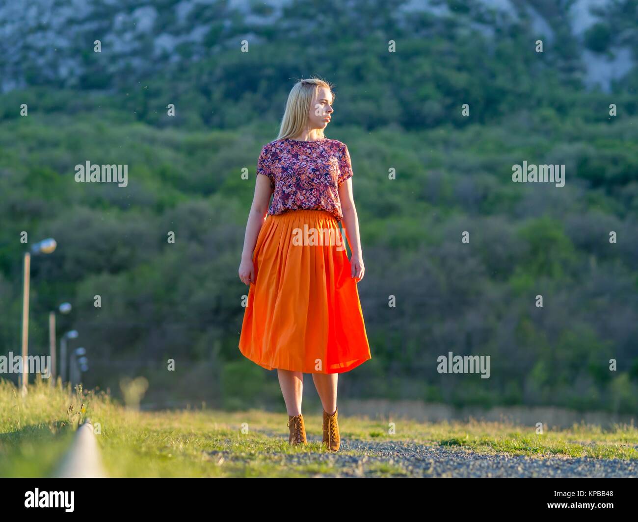 Woman Standing Facing Away Stock Photos & Woman Standing Facing Away ...