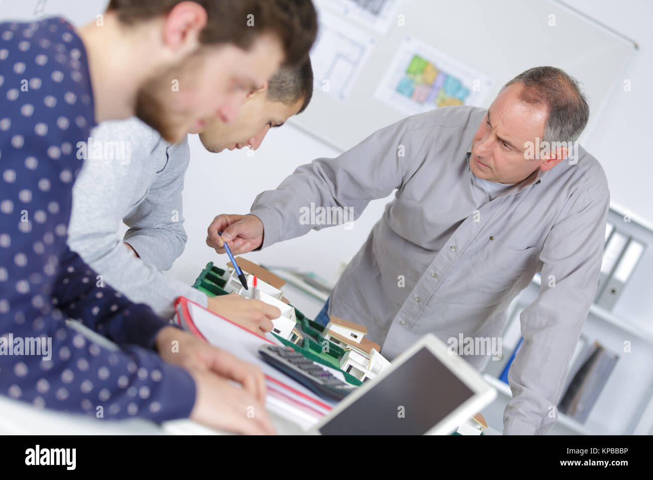 architecture student in workshop with teacher Stock Photo - Alamy