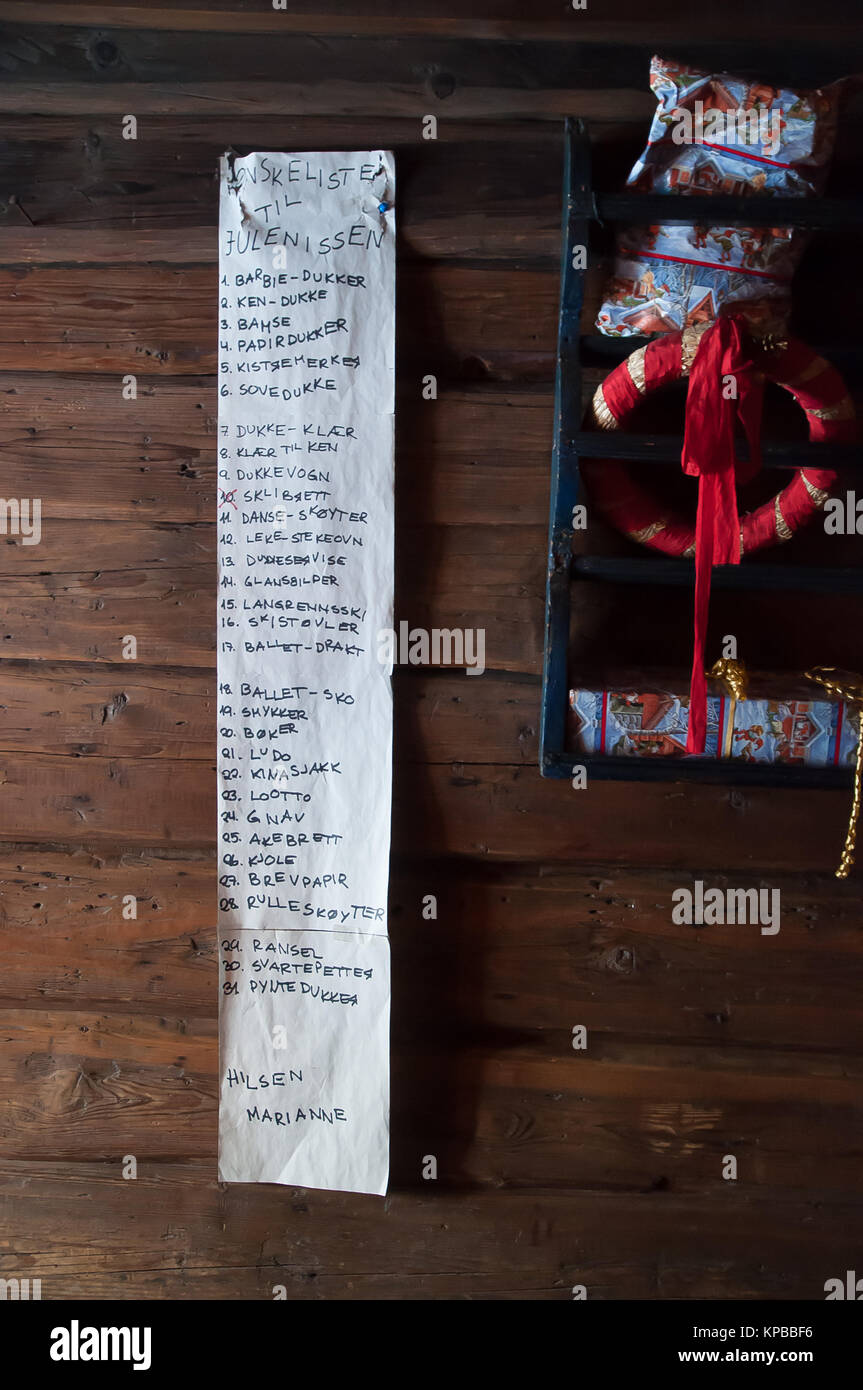A child's wish list for Santa hung on the wall Stock Photo - Alamy
