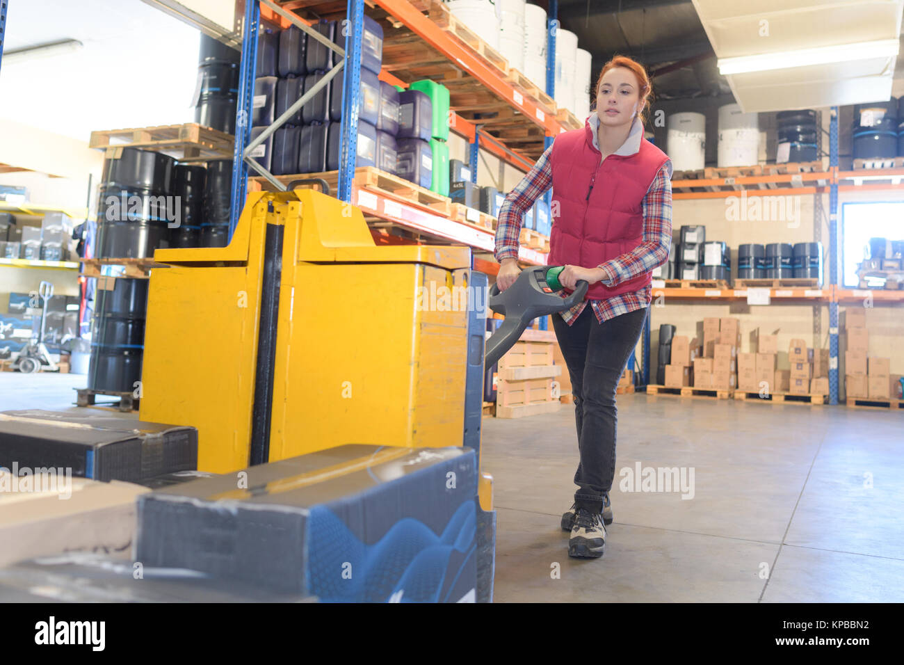 female stacking the product Stock Photo - Alamy