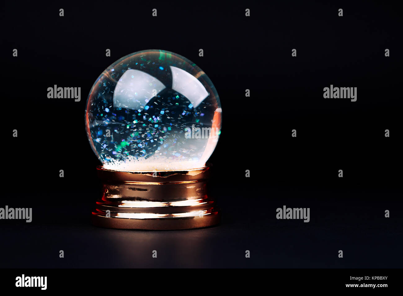 Beautiful snow ball with snowfall inside over black background Stock ...