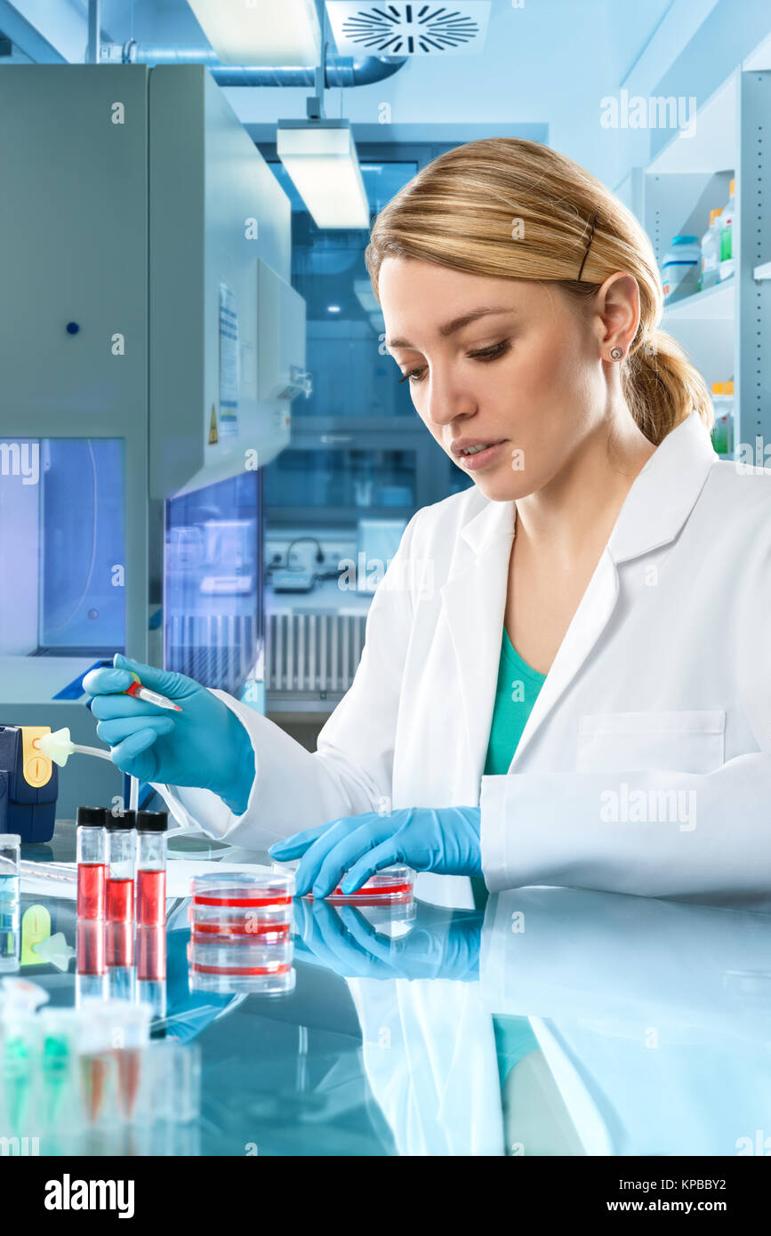 Scientist works in experiment facility hi-res stock photography and ...