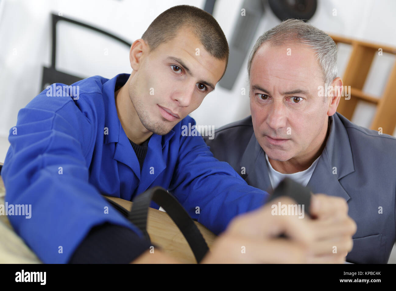 teacher observing the apprentice Stock Photo - Alamy