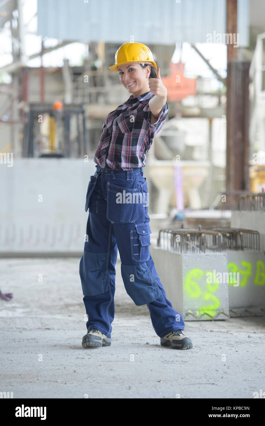 happy woman worker with approval sign Stock Photo - Alamy