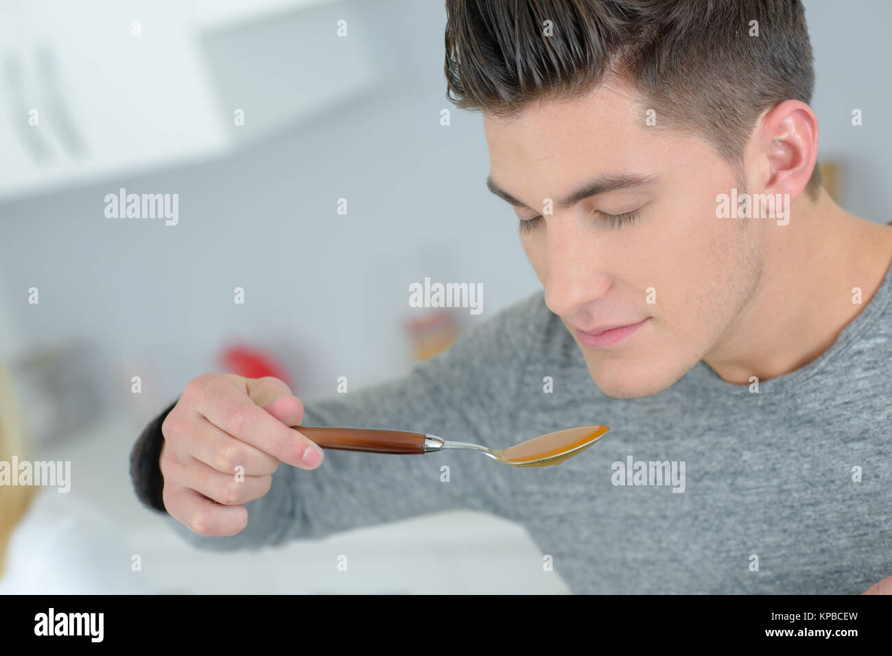 man eating soup Stock Photo - Alamy