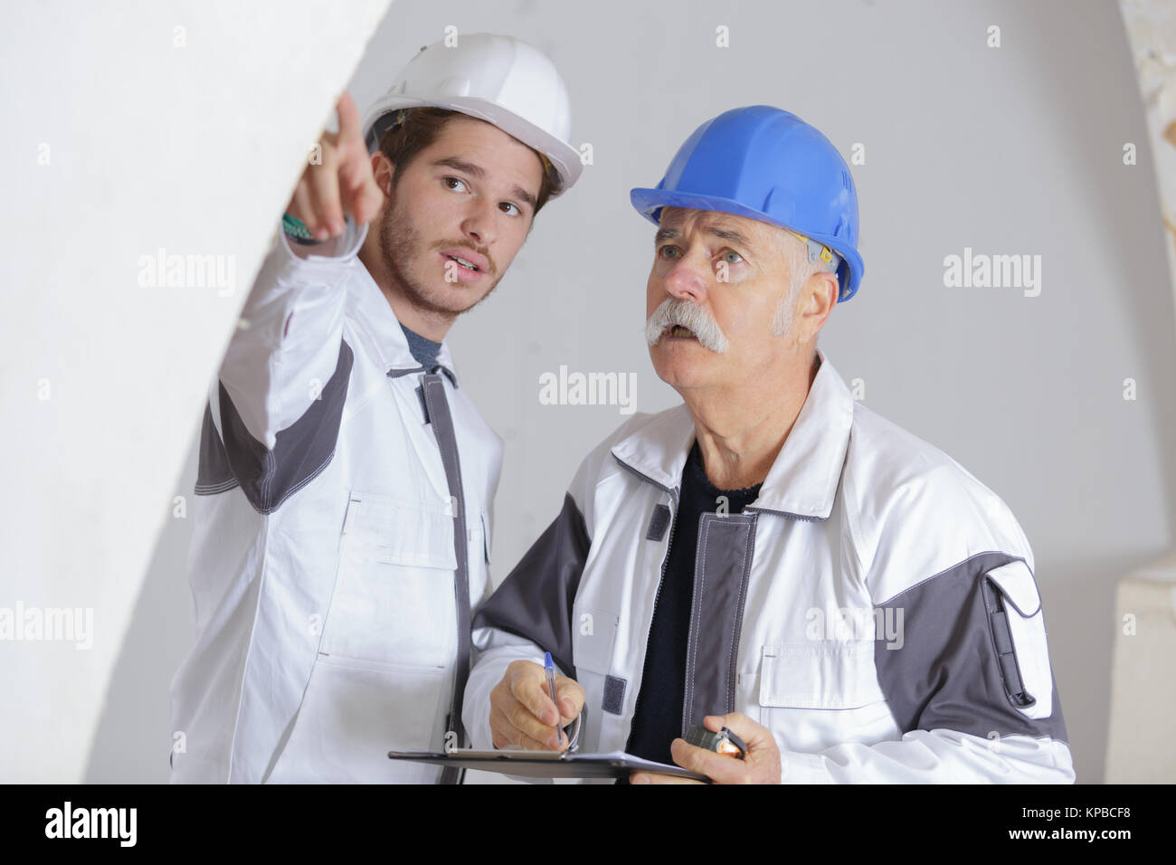 two construction workers at site Stock Photo - Alamy