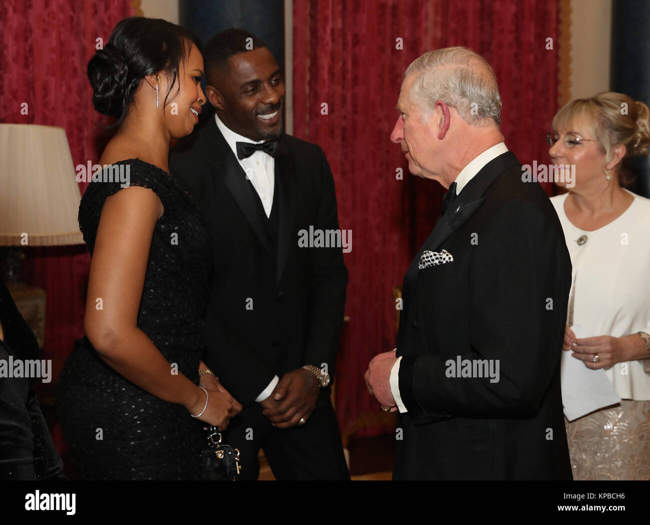 The Prince of Wales (right) meets Idris Elba and his partner Sabrina ...