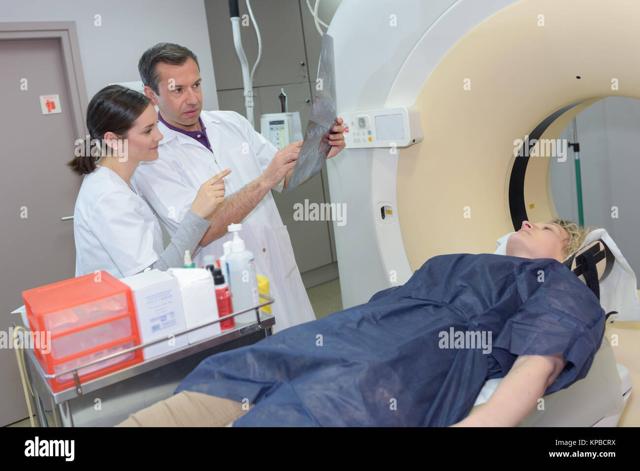 Female radiologist examining brain hi-res stock photography and images ...