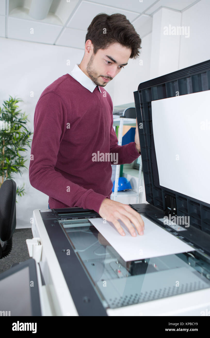 man scanning a document Stock Photo - Alamy