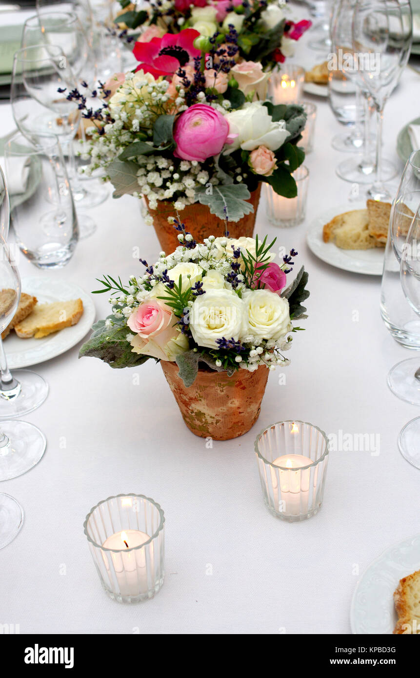 table set for wedding with flowers, decorations and candles Stock Photo ...