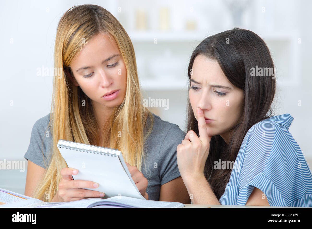 female students lost in thought Stock Photo - Alamy