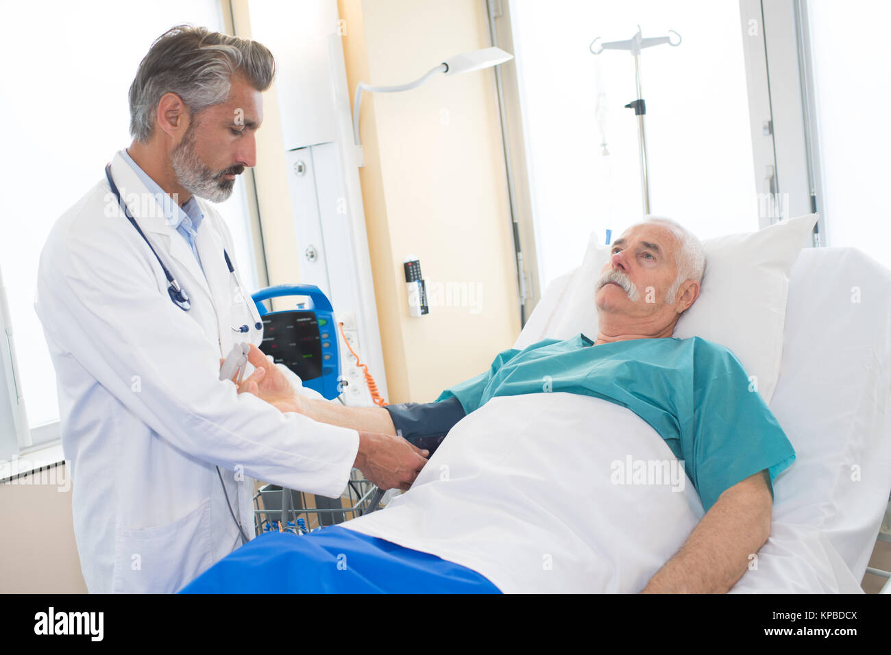 doctor with senior patient Stock Photo - Alamy