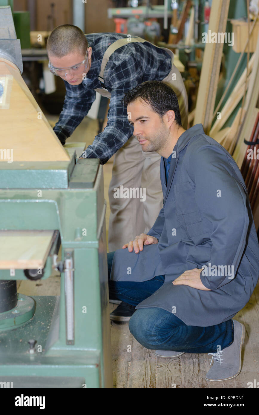 using a carpentry machine Stock Photo - Alamy
