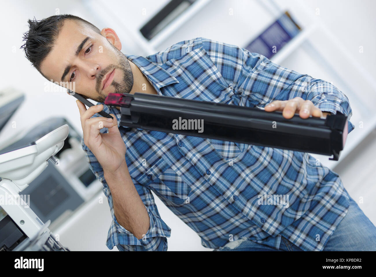 man repairing color printer changing toner cartridge Stock Photo - Alamy