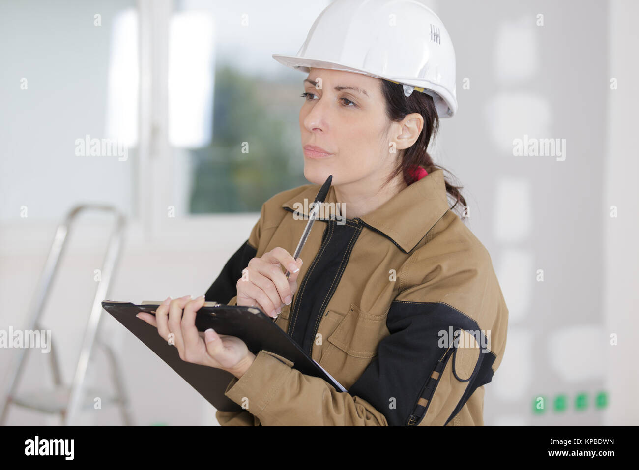 female building manager doing the inspection Stock Photo - Alamy