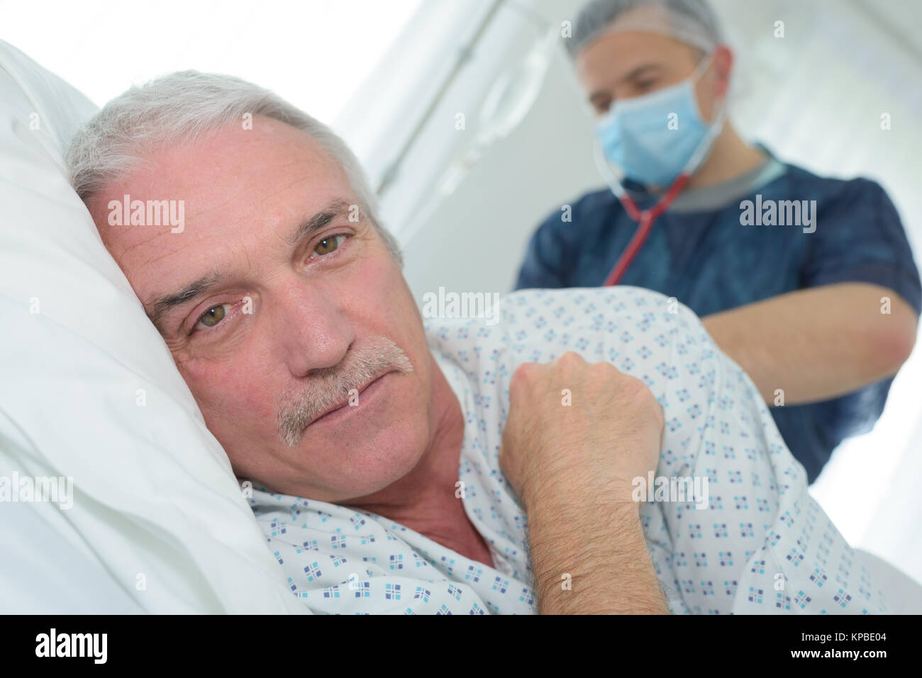 happy patient lying on his bed in hospital Stock Photo - Alamy
