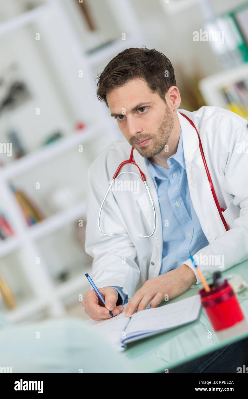 medical doctor writing prescription Stock Photo - Alamy