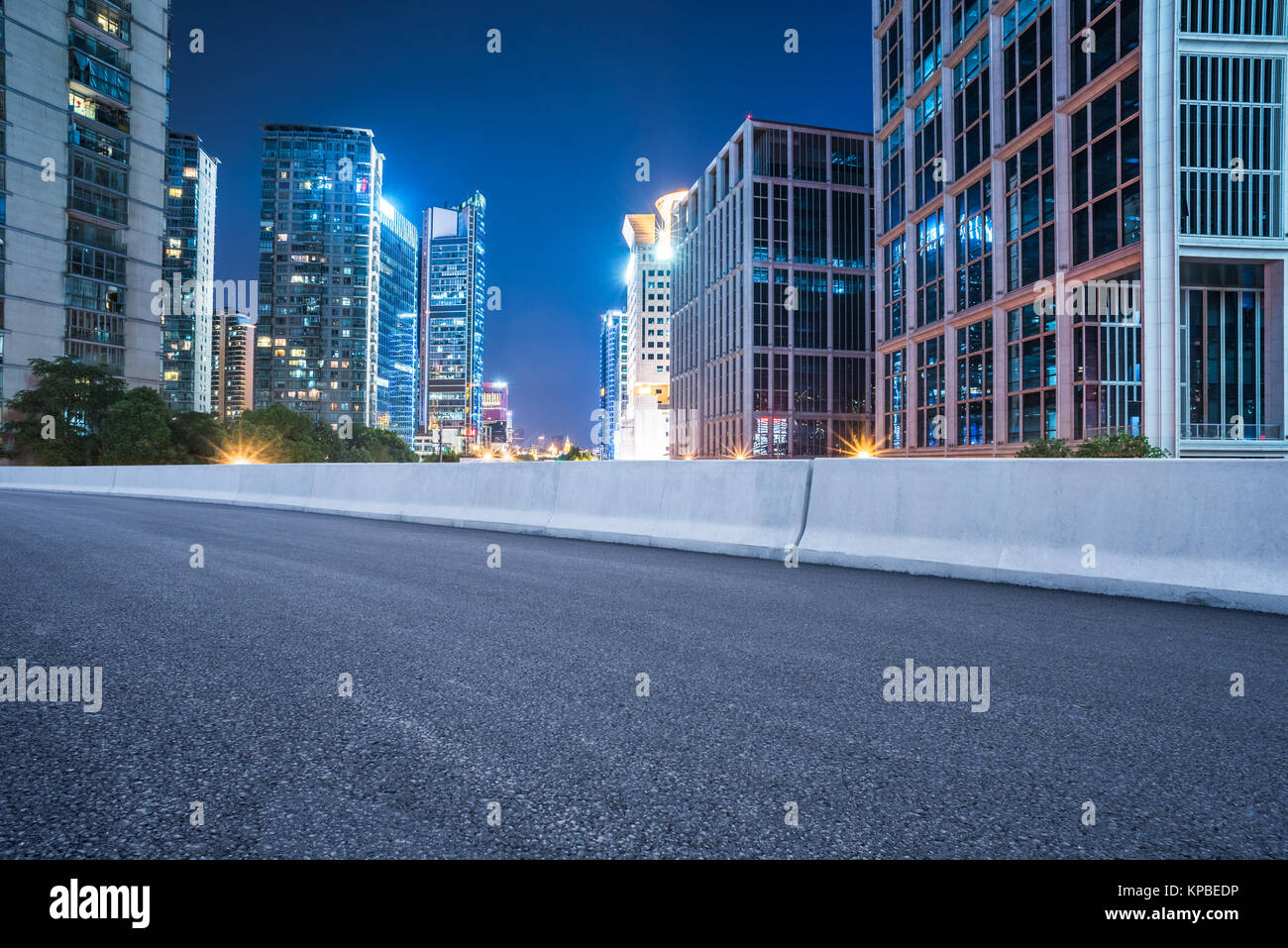empty asphalt road through modern city in China Stock Photo - Alamy
