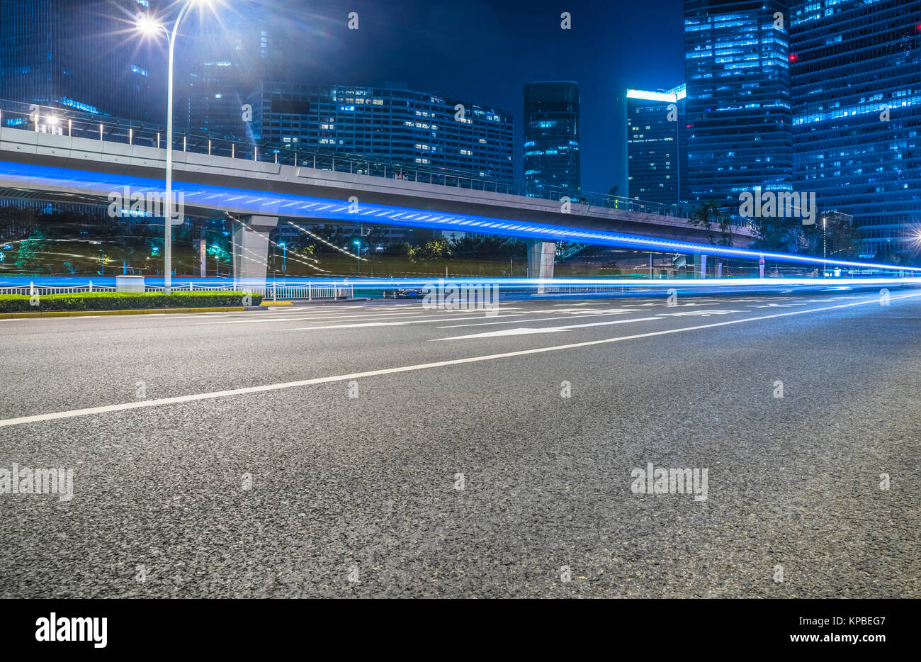 empty asphalt road through modern city in China Stock Photo - Alamy