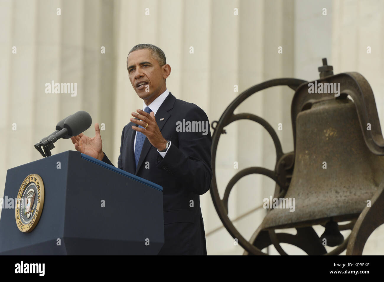 US President Barack Obama delivers remarks in front of a freedom bell ...