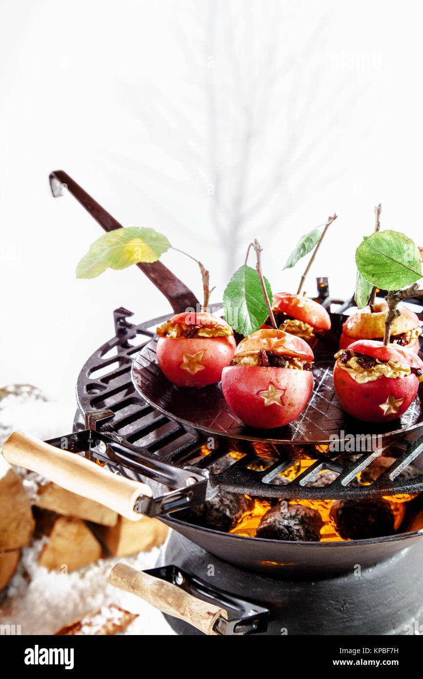 delicious red apples stuffed on the grill Stock Photo - Alamy