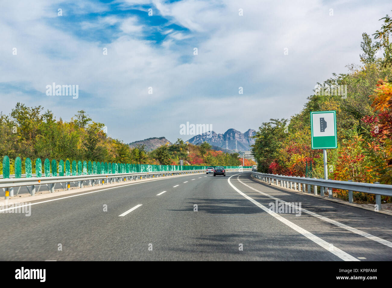 modern highway through mountains in city of China Stock Photo - Alamy