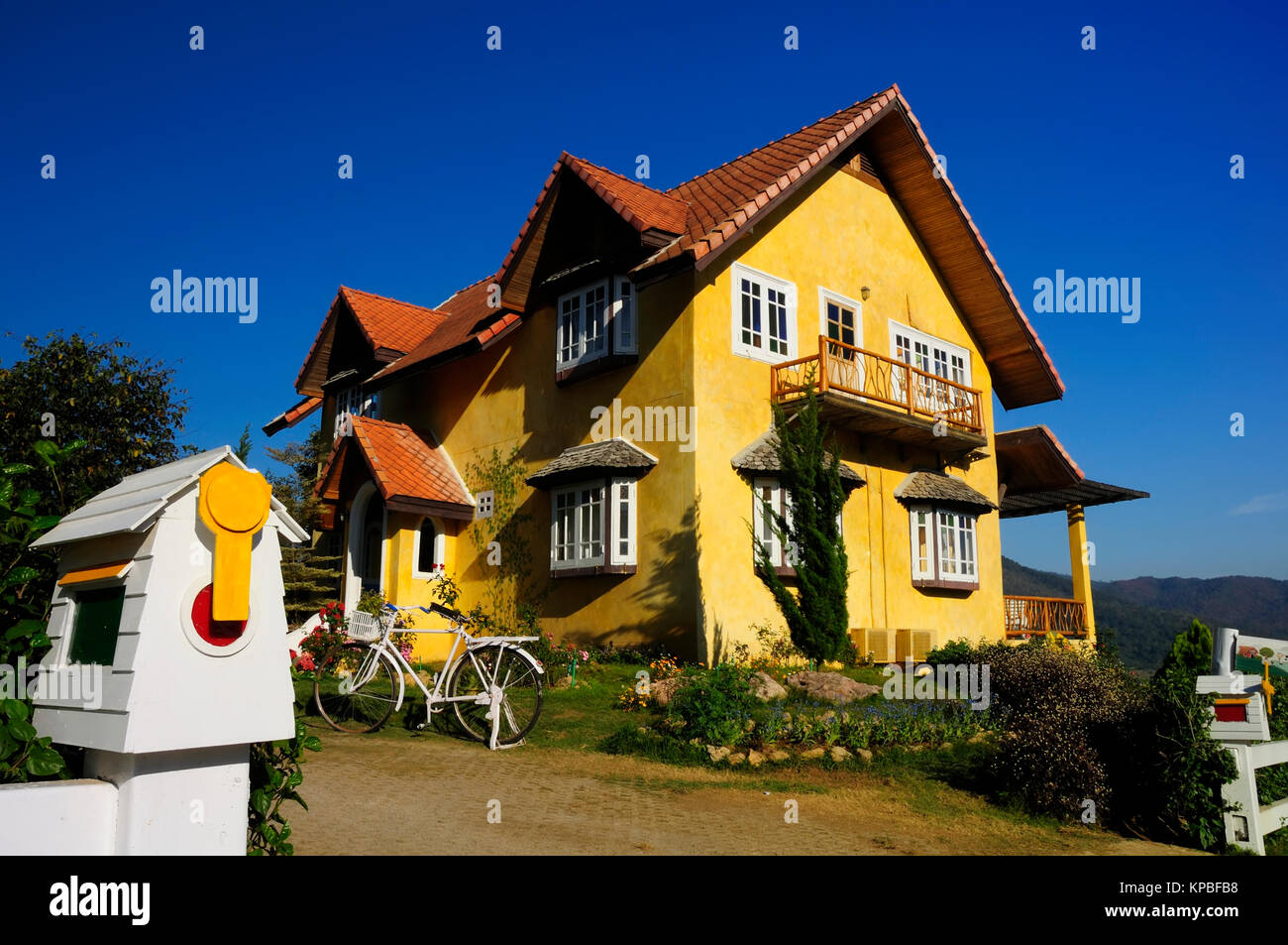 The Yellow House is located on a hill in the north, Thailand Stock ...