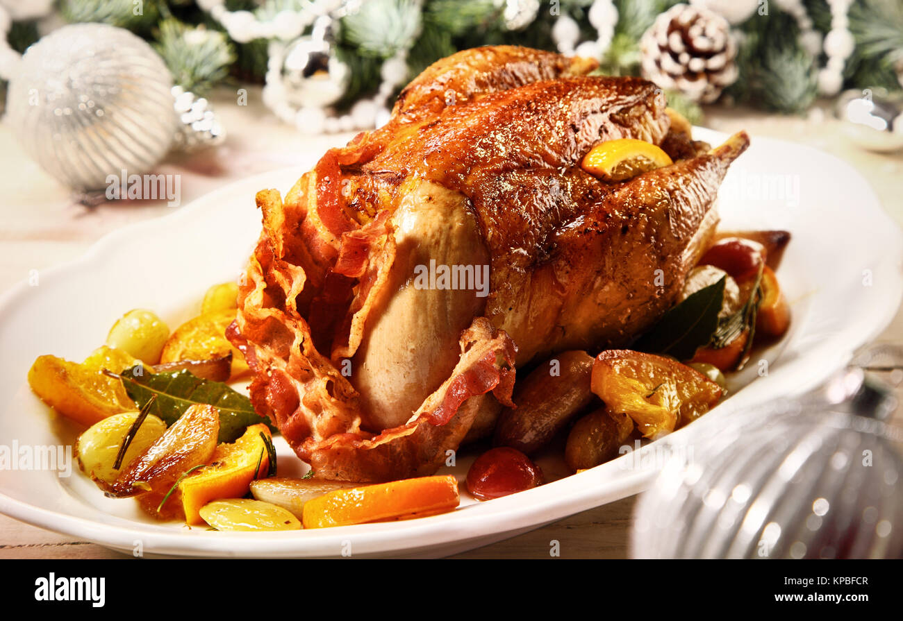 Festive roasted Christmas venison food with delicious pheasant and ...