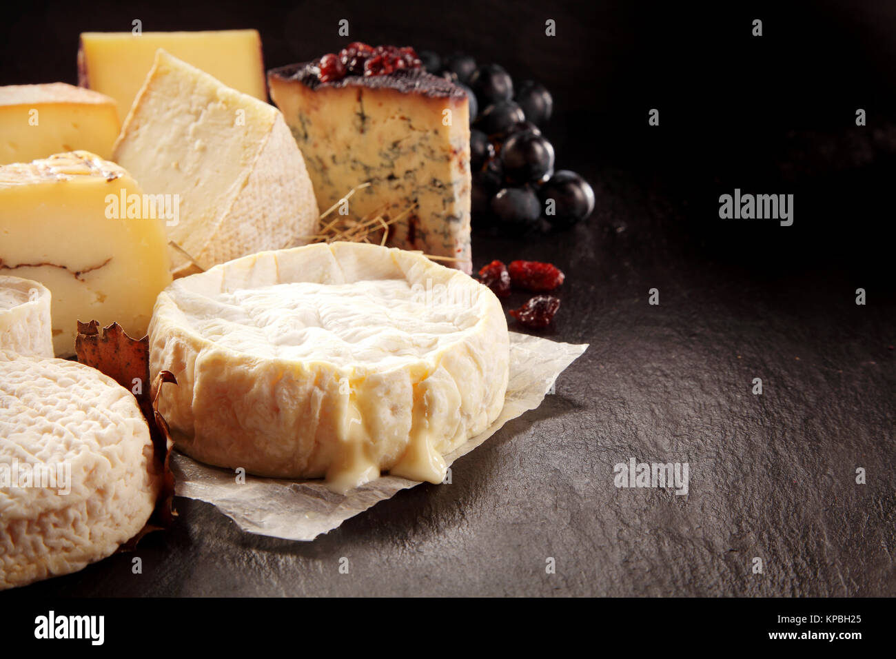 Close Up Still Life of Variety of Gourmet Cheeses with Soft Melting ...