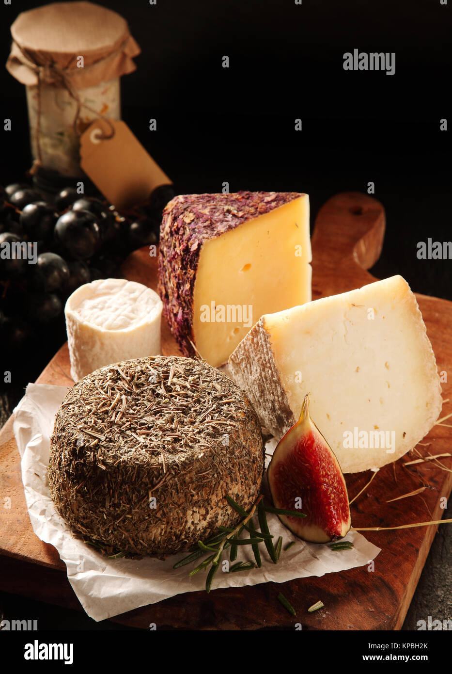 High Angle of Round Wheel of Soft Cheese Coated in Savory Dried Herbs ...