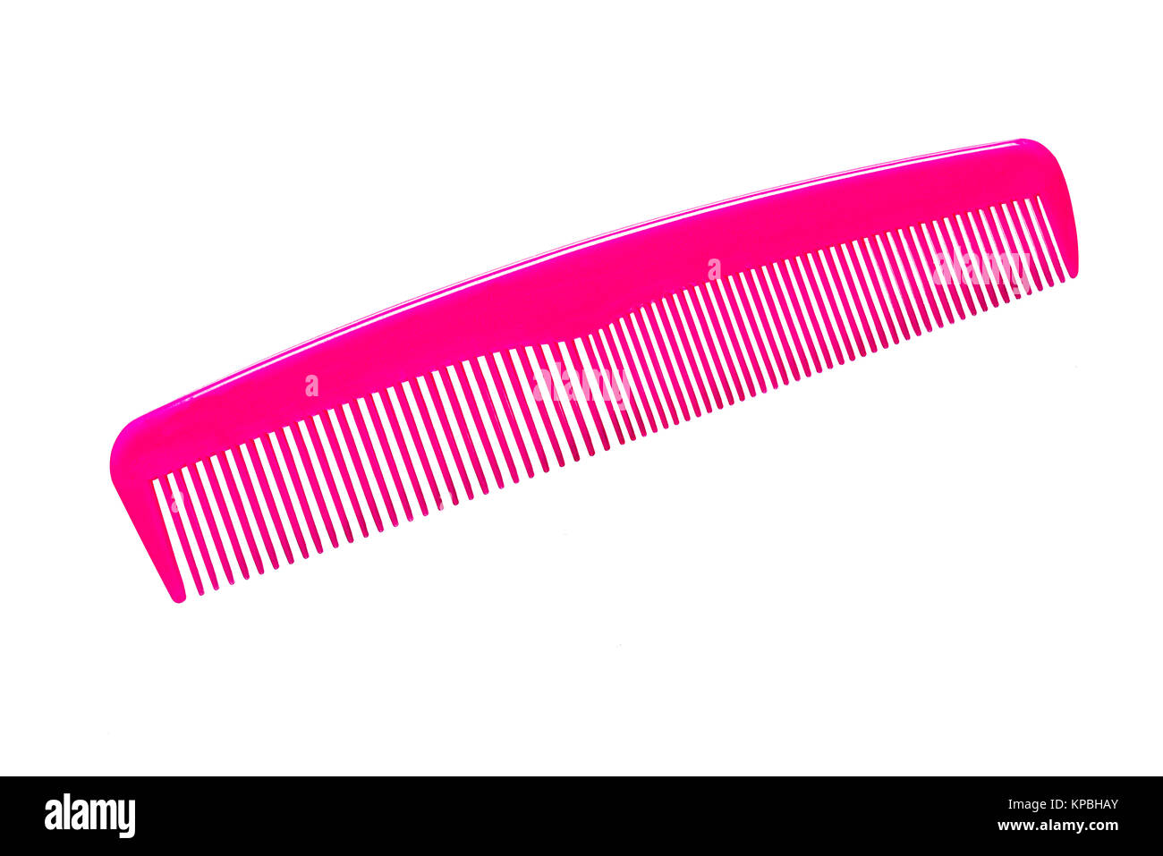 Pink hair comb isolated on a white background Stock Photo - Alamy