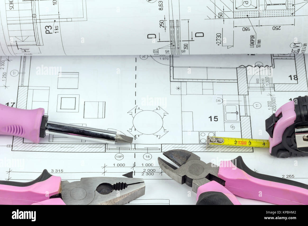 Homework tools with pink design on the blueprint Stock Photo - Alamy