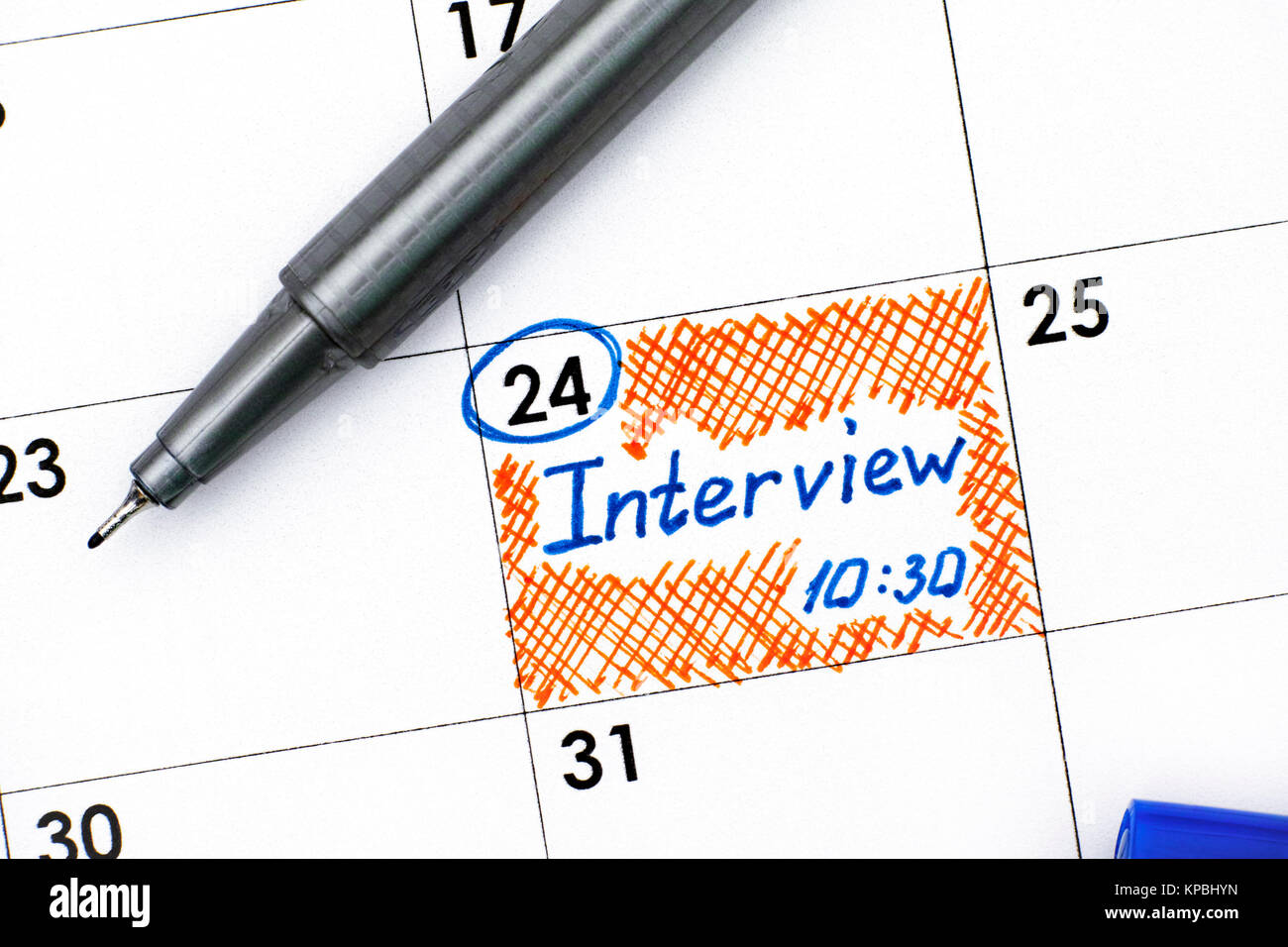 Reminder Interview 10-30 in calendar with pen. Close-up Stock Photo - Alamy