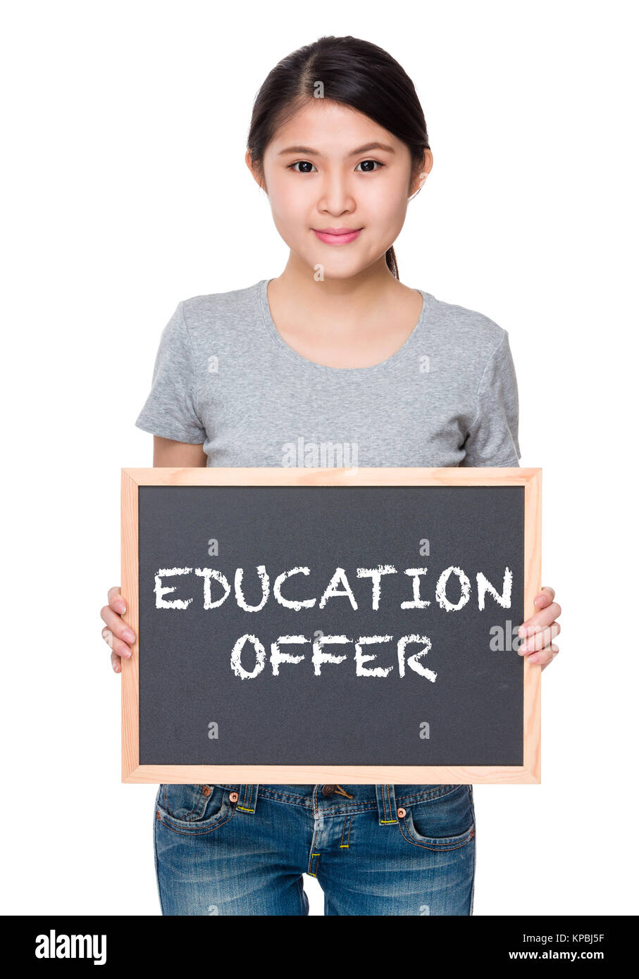 Woman hold with chalkboard and showing education offer Stock Photo - Alamy