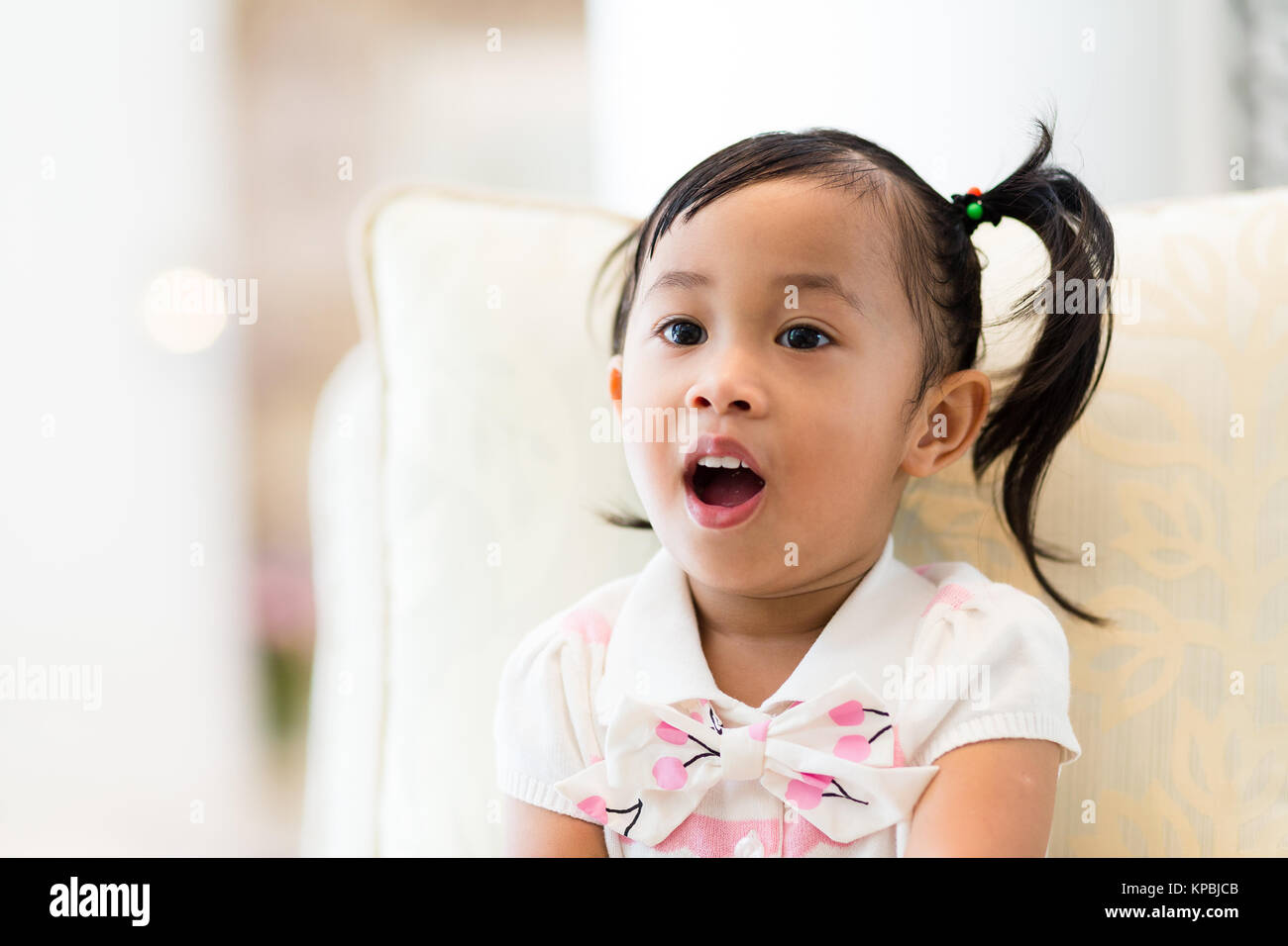 Little girl want to say something Stock Photo - Alamy