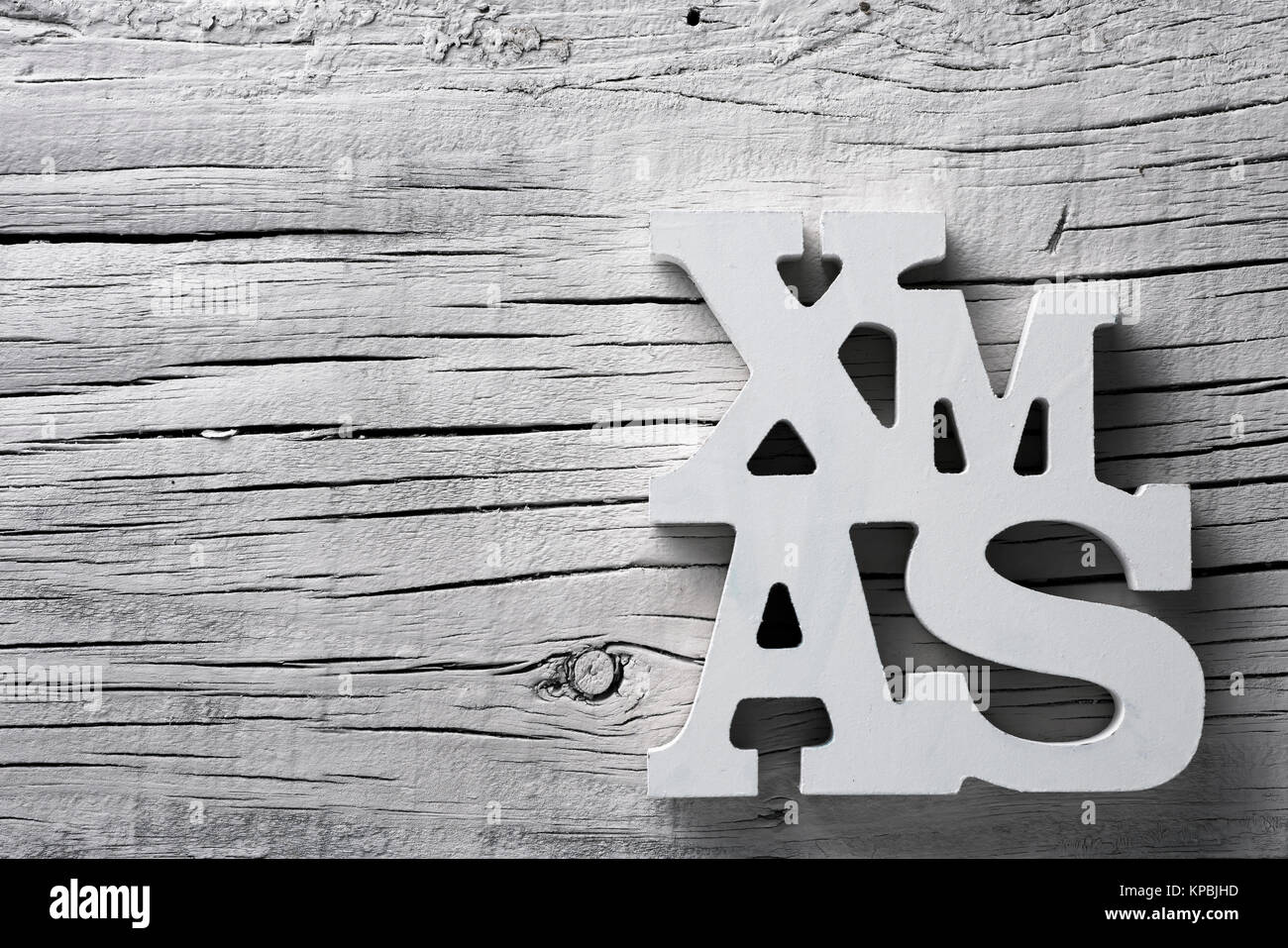 three-dimensional word xmas, abbreviation for christmas, against a ...