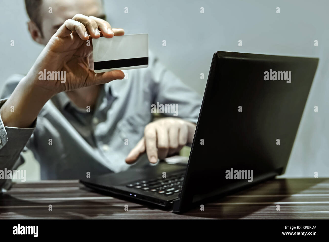 Businessman making online payment holding hi-res stock photography and images - Alamy